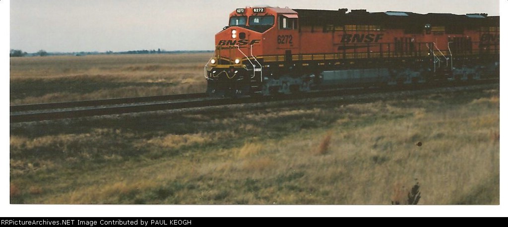 BNSF 6272 emerges from under Hwy. 30 west as she rolls west towards Ravenna, NE on her maiden run.